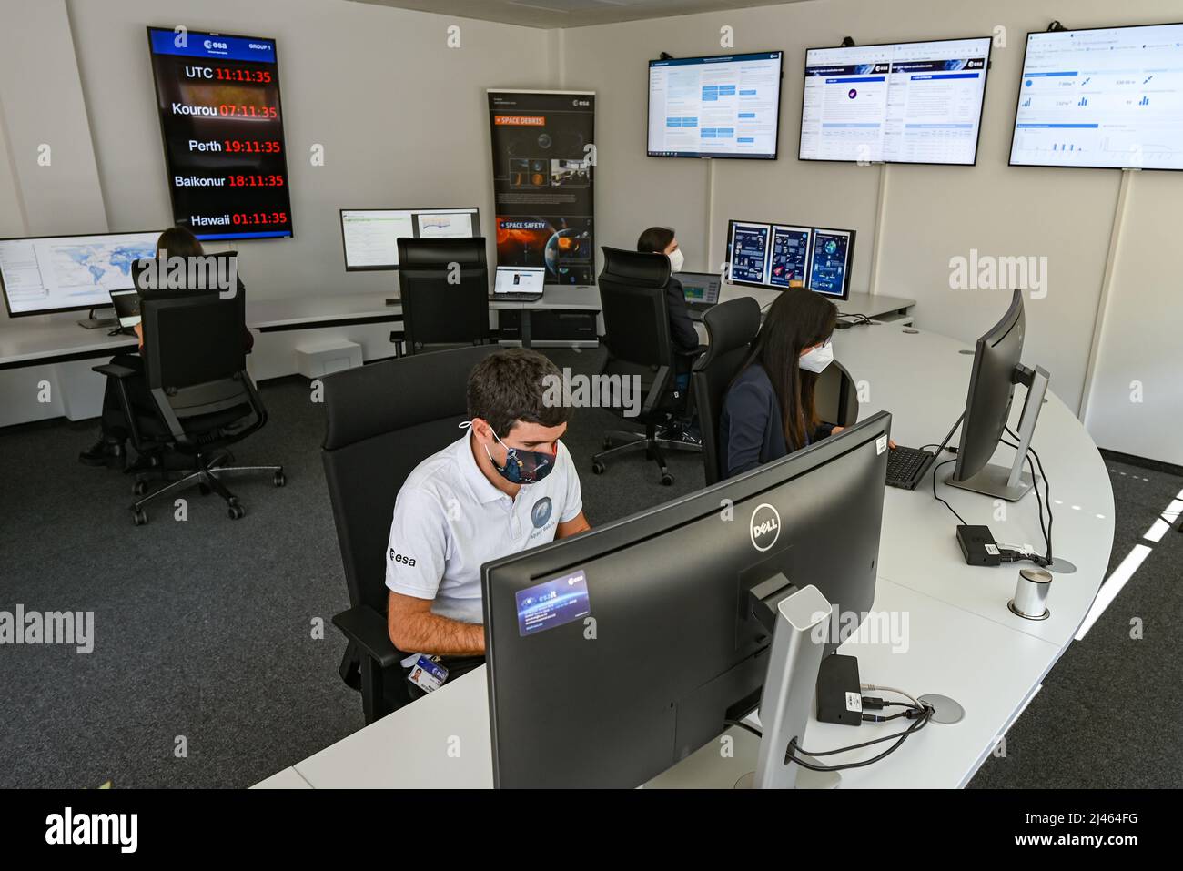 Darmstadt, Germany. 12th Apr, 2022. Engineers sit in front of their ...