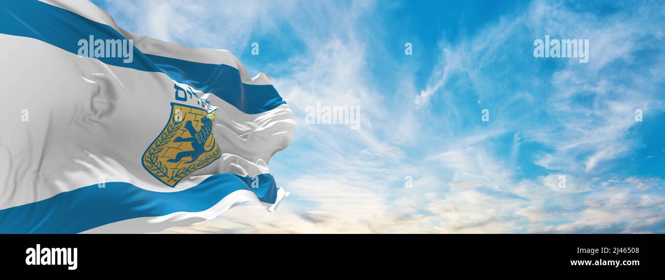 flag of Jerusalem , Israel at cloudy sky background on sunset ...