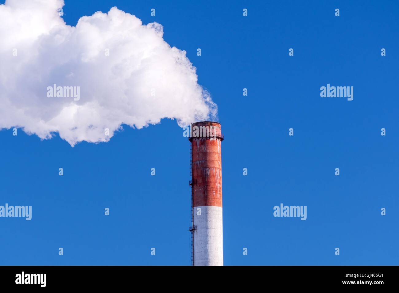 Smoke stack with smoke emission. Plant pipes pollute atmosphere ...