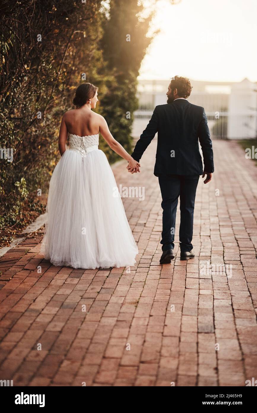 May be always walk through life together. Rearview shot of a couple ...