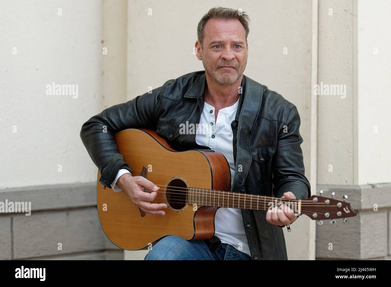 Cologne, Germany. 12th Apr, 2022. Actor Kai Noll stands on the set of ...