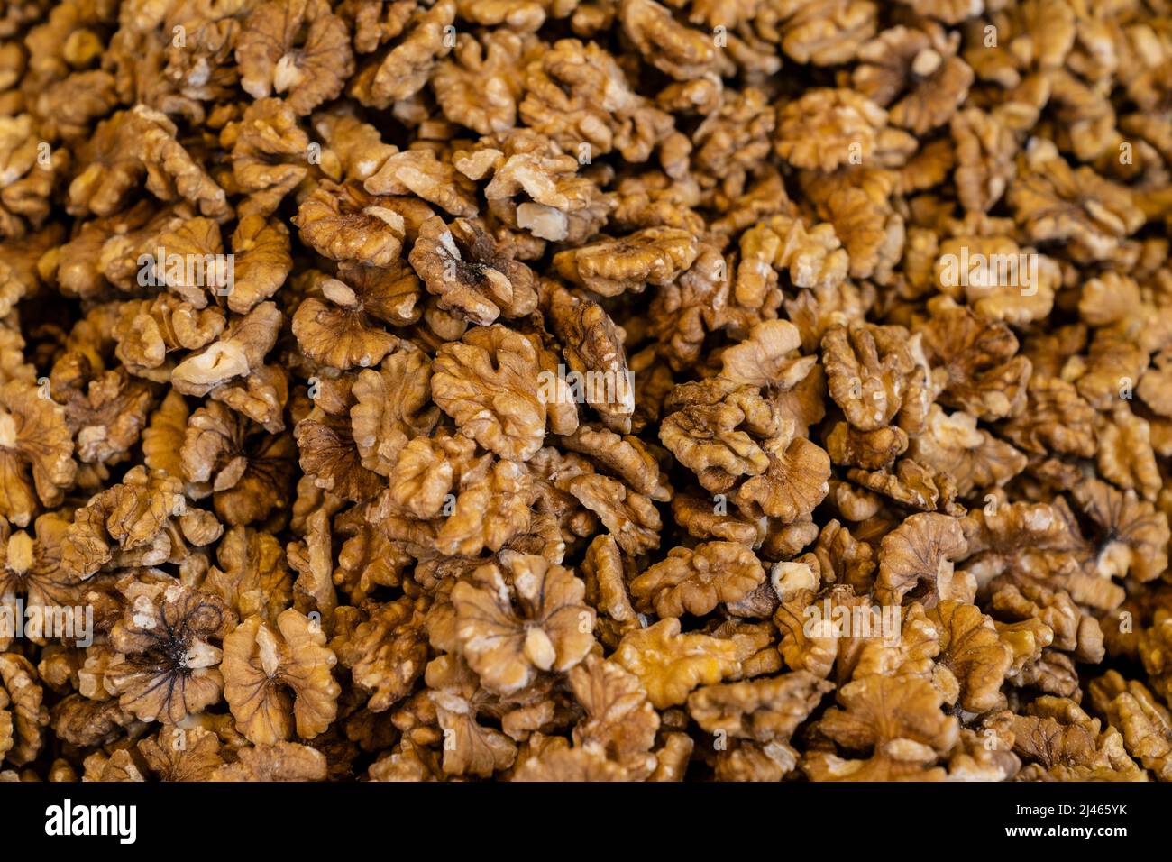 Peeled dried cleaned walnuts as background Stock Photo - Alamy