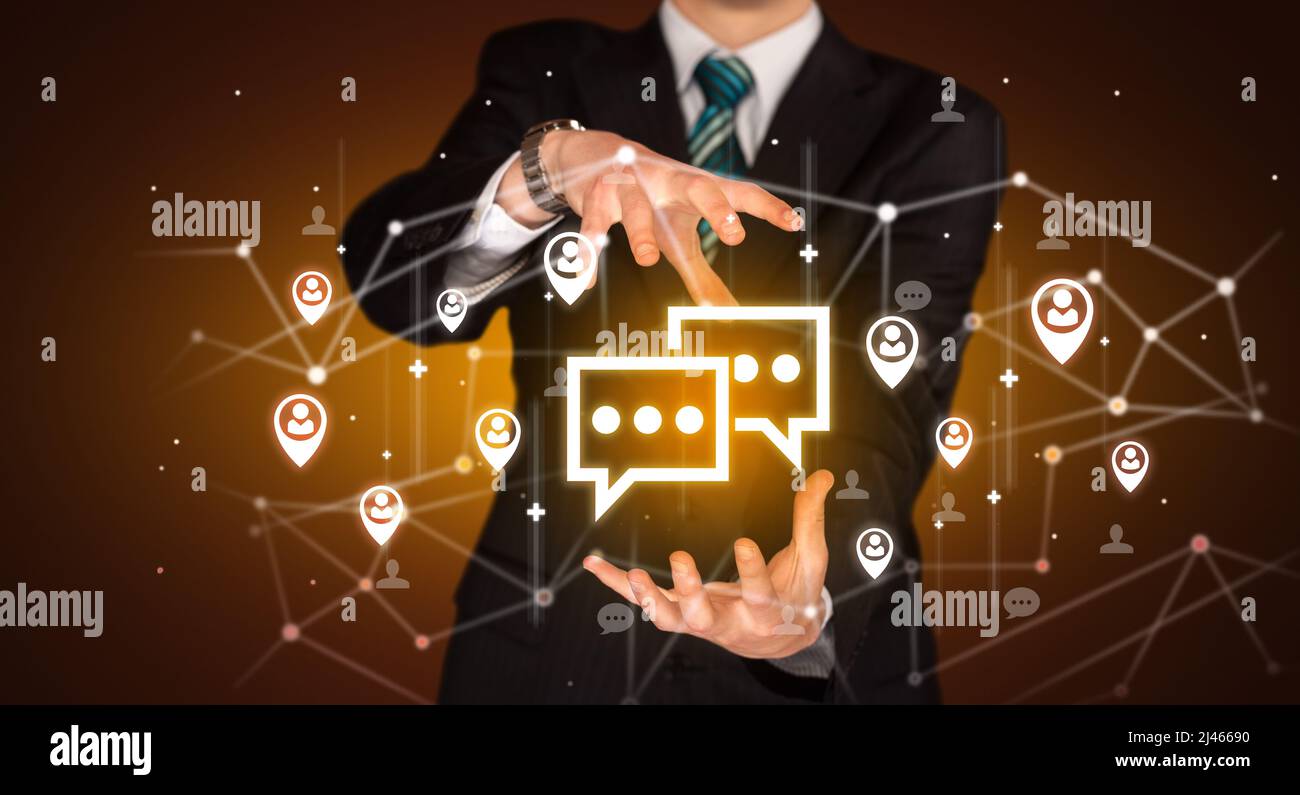 Hand holding social media icons Stock Photo - Alamy