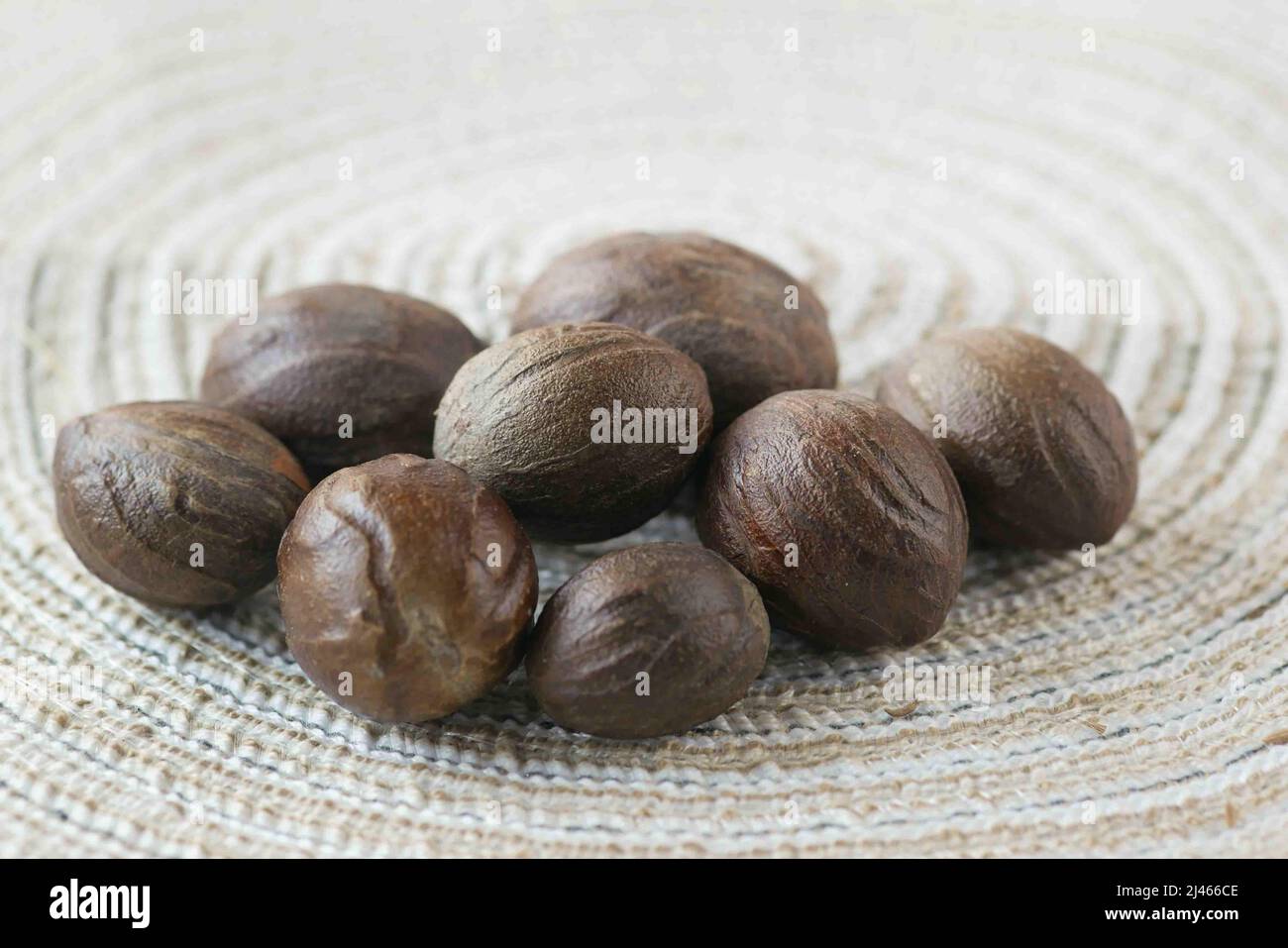 Ground nutmeg on table close up Stock Photo - Alamy