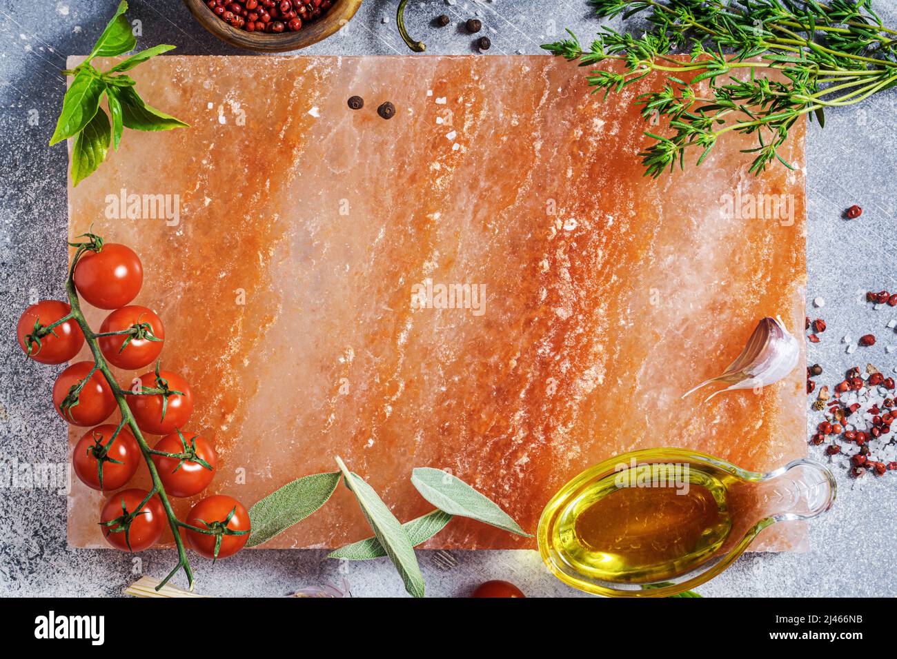 Food background with copy space. Pink himalayan salt block for cooking ...