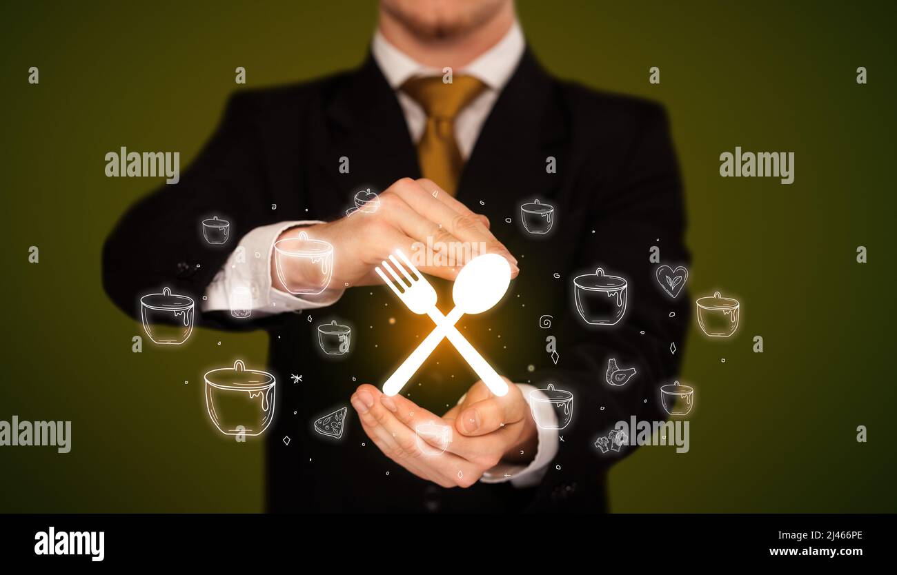 Hand holding food related icons Stock Photo - Alamy