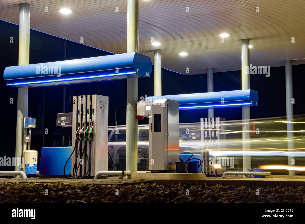 Night traffic at the gas station Stock Photo - Alamy