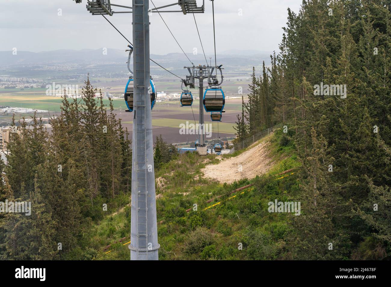 Haifa, Israel - April 12, 2022: Rakavlit - commuter service cable car ...