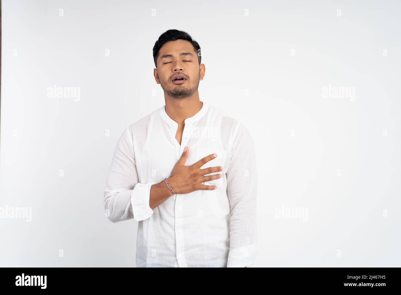 Asian hands on chest hi-res stock photography and images - Alamy