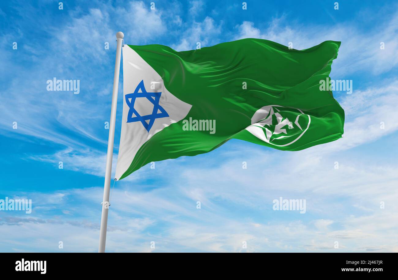 flag of IDF Military Intelligence Directorate , Israel at cloudy sky ...