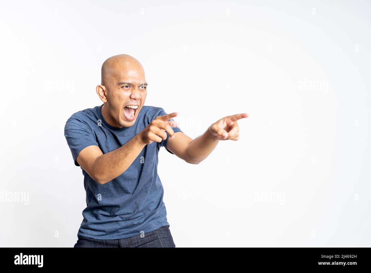 asian bald man while laughing with both fingers pointing Stock Photo ...