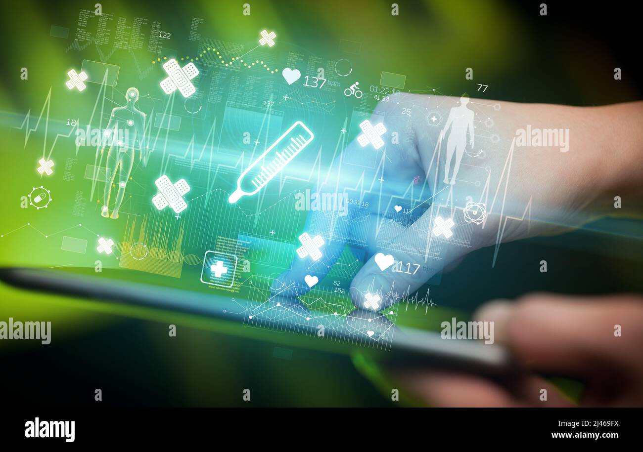 Close-up of a touchscreen with healthcare icons Stock Photo - Alamy