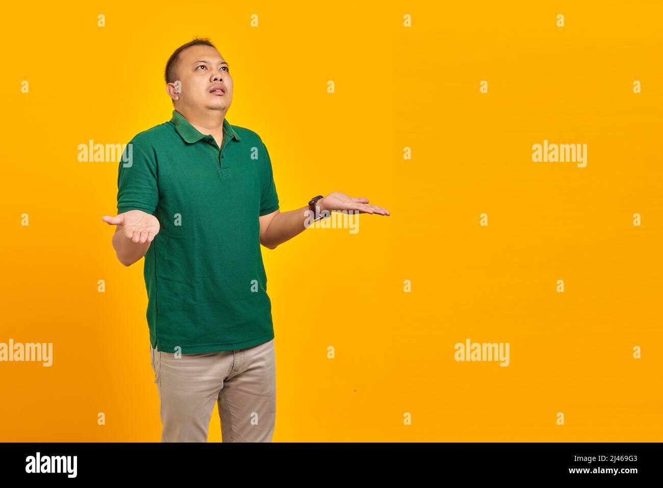 Portrait of asian man surprised with confused and displeased expression ...