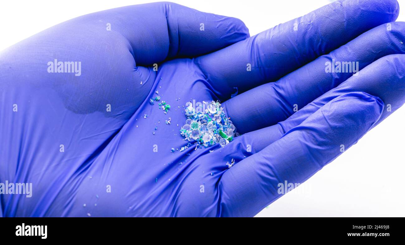 Microplastic hand hi-res stock photography and images - Alamy