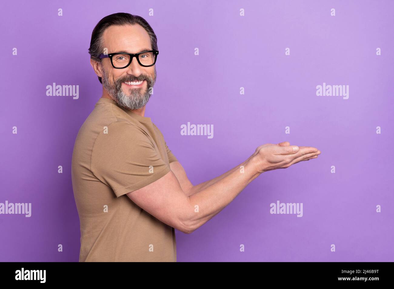 Profile side photo of good mood man promoting cool product make charity ...