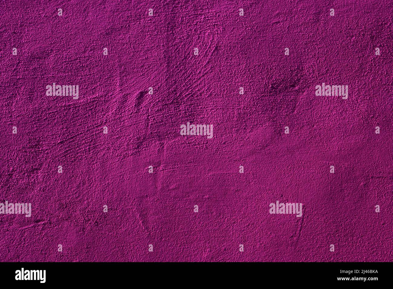 Magenta colored wall texture background with textures of different ...