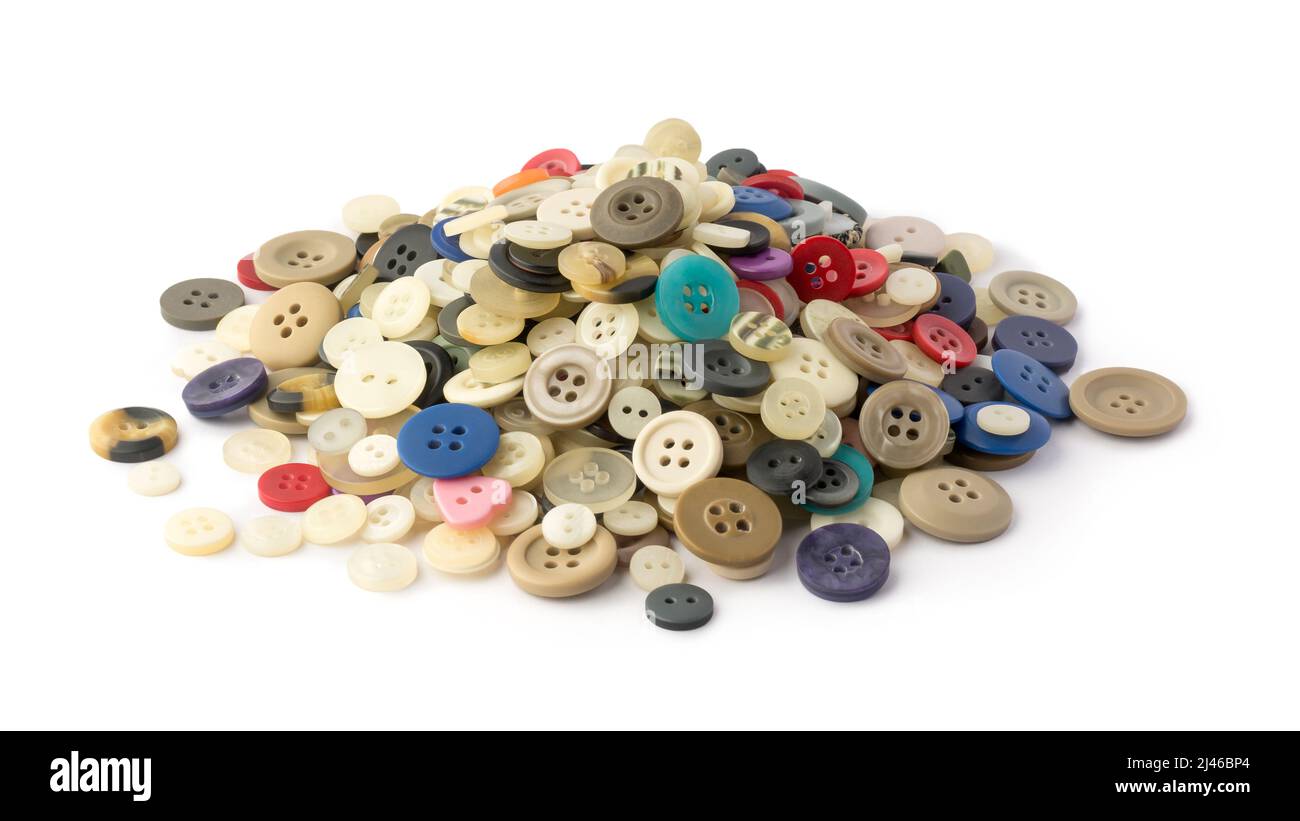 pile of various colors and design buttons on white background Stock ...