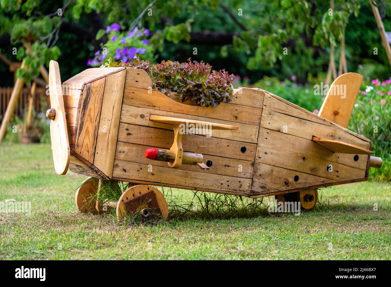 Wood plane decoration in the garden Stock Photo - Alamy