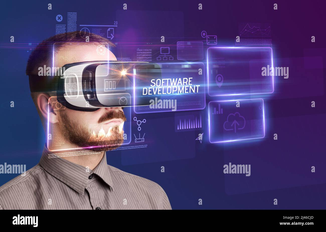 Businessman looking through Virtual Reality glasses, tech concept Stock ...