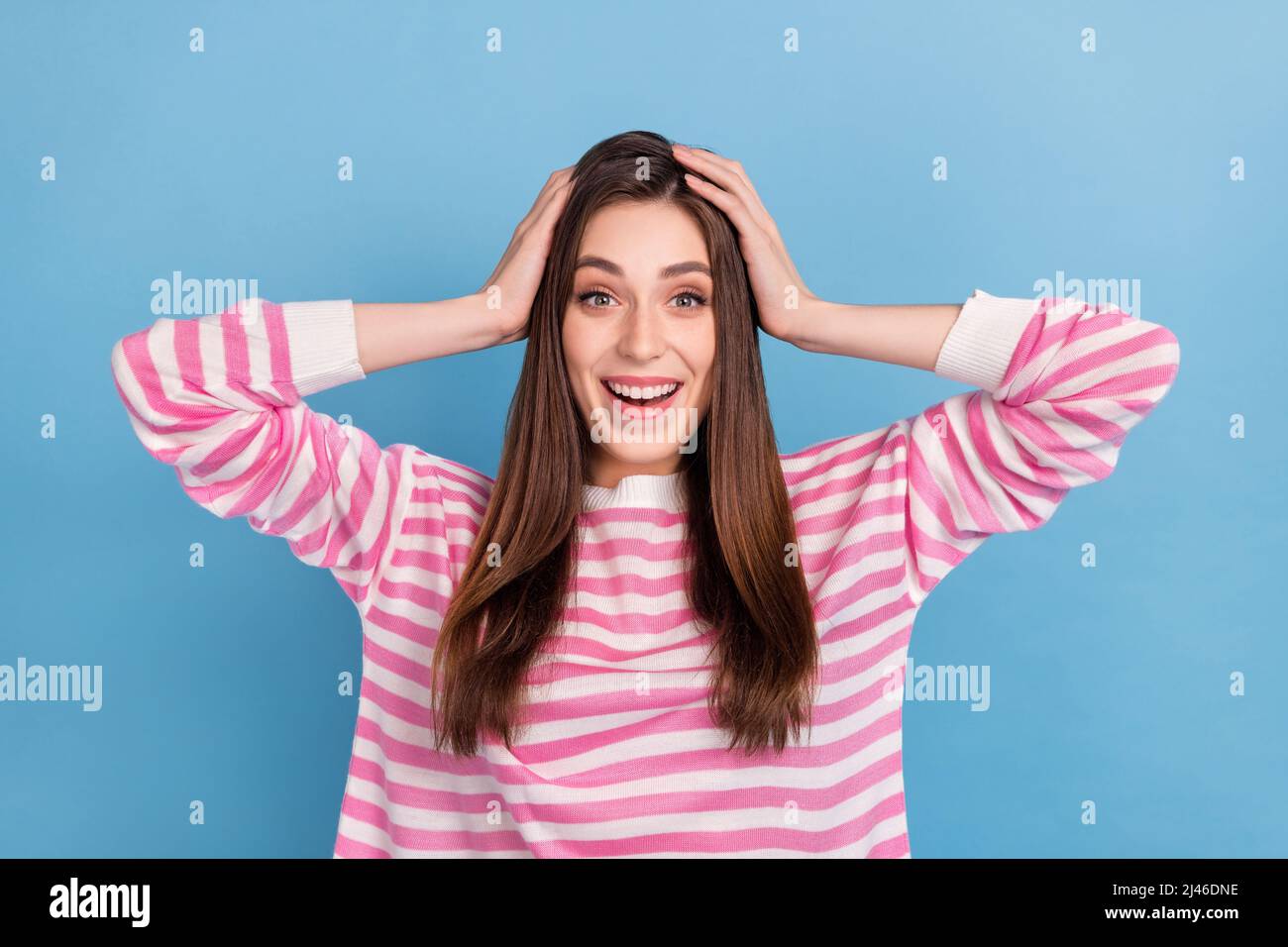 Photo of astonished person arms head toothy smile look camera isolated ...