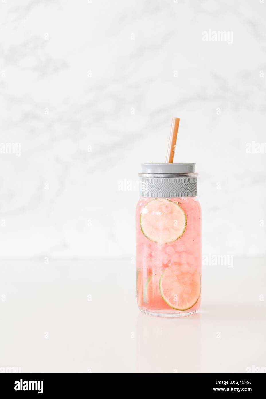 pink limeade inside a clear bottle Stock Photo - Alamy