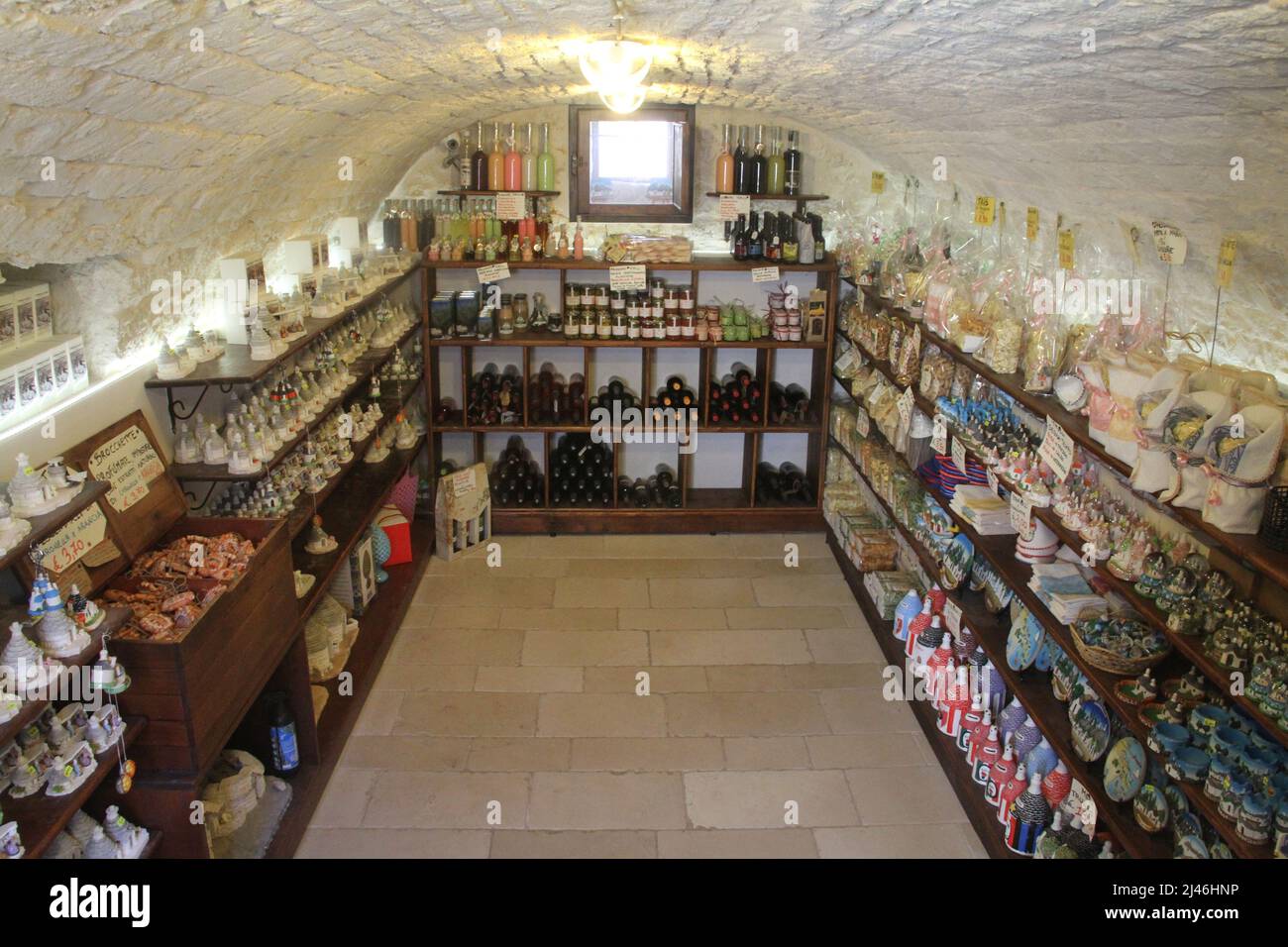 Interior of a souvenir shop inside a traditional trullo rock house in ...