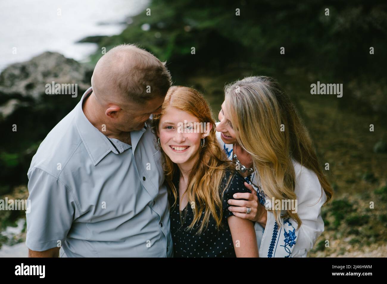 Teen hugs parents hi-res stock photography and images - Alamy