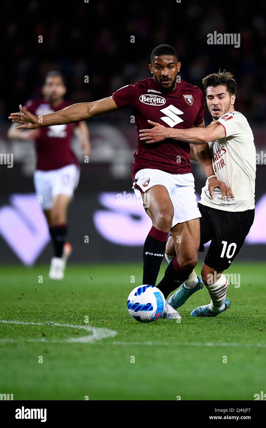 Turin, Italy. 10 April 2022. Gleison Bremer (L) of Torino FC competes ...