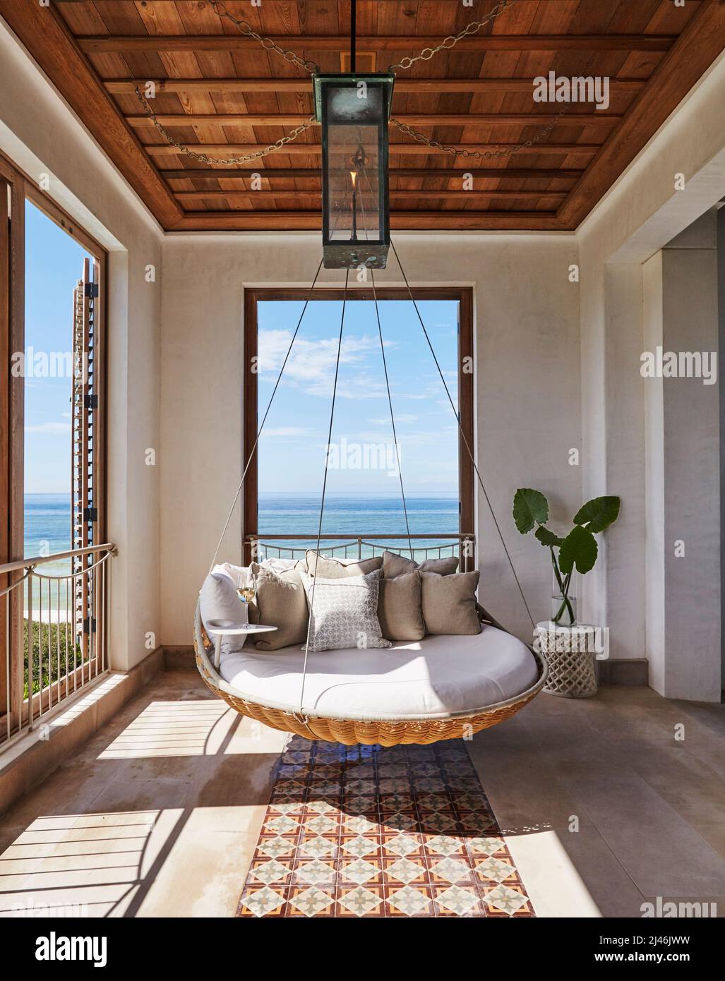 Beach porch swing hi-res stock photography and images - Alamy