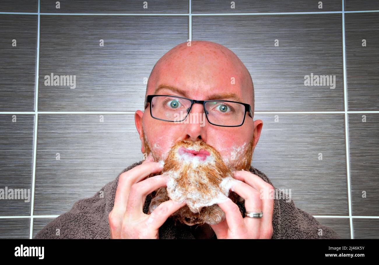 man washing beard Stock Photo - Alamy