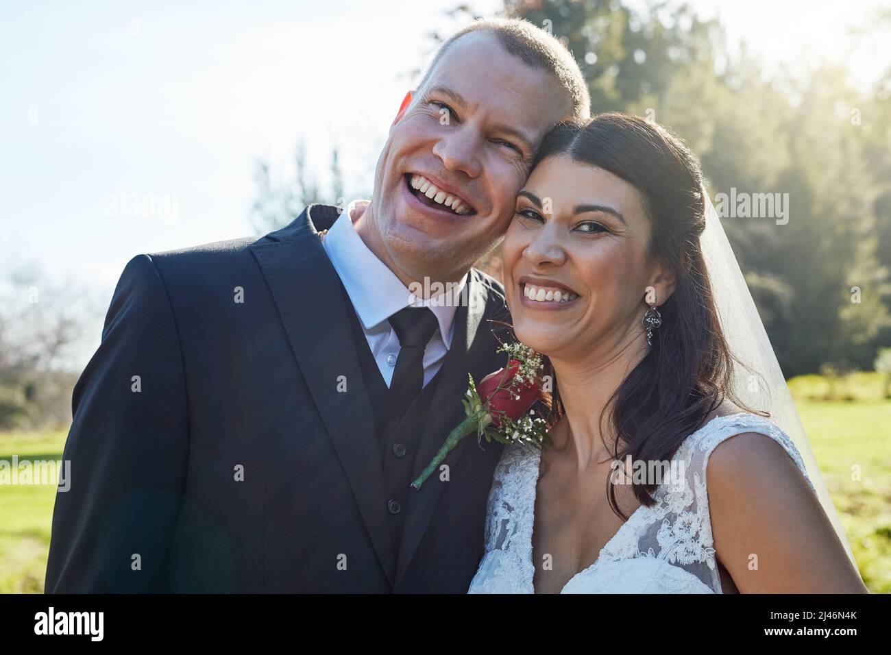 Its the beginning of forever. Portrait of a bride and groom standing ...