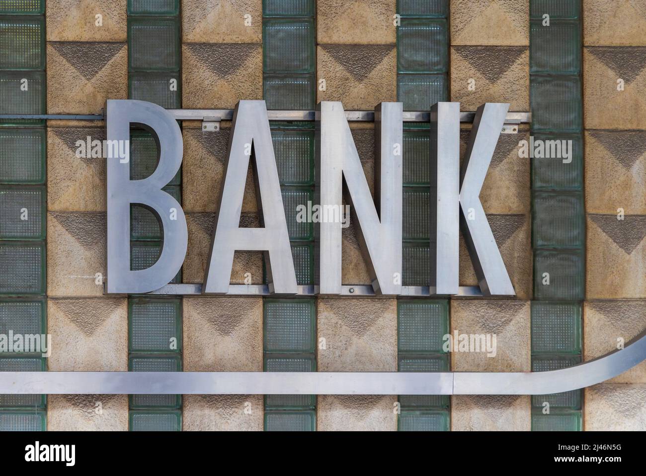 Big Silver Sign Bank at Office Building Wall Stock Photo - Alamy