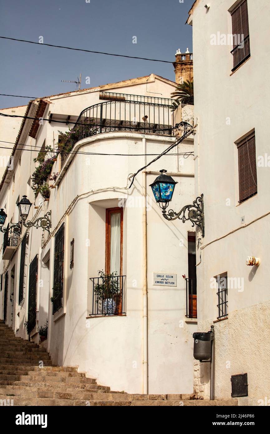 Architectural detail of mainly white dwellings and colourful lamps in ...