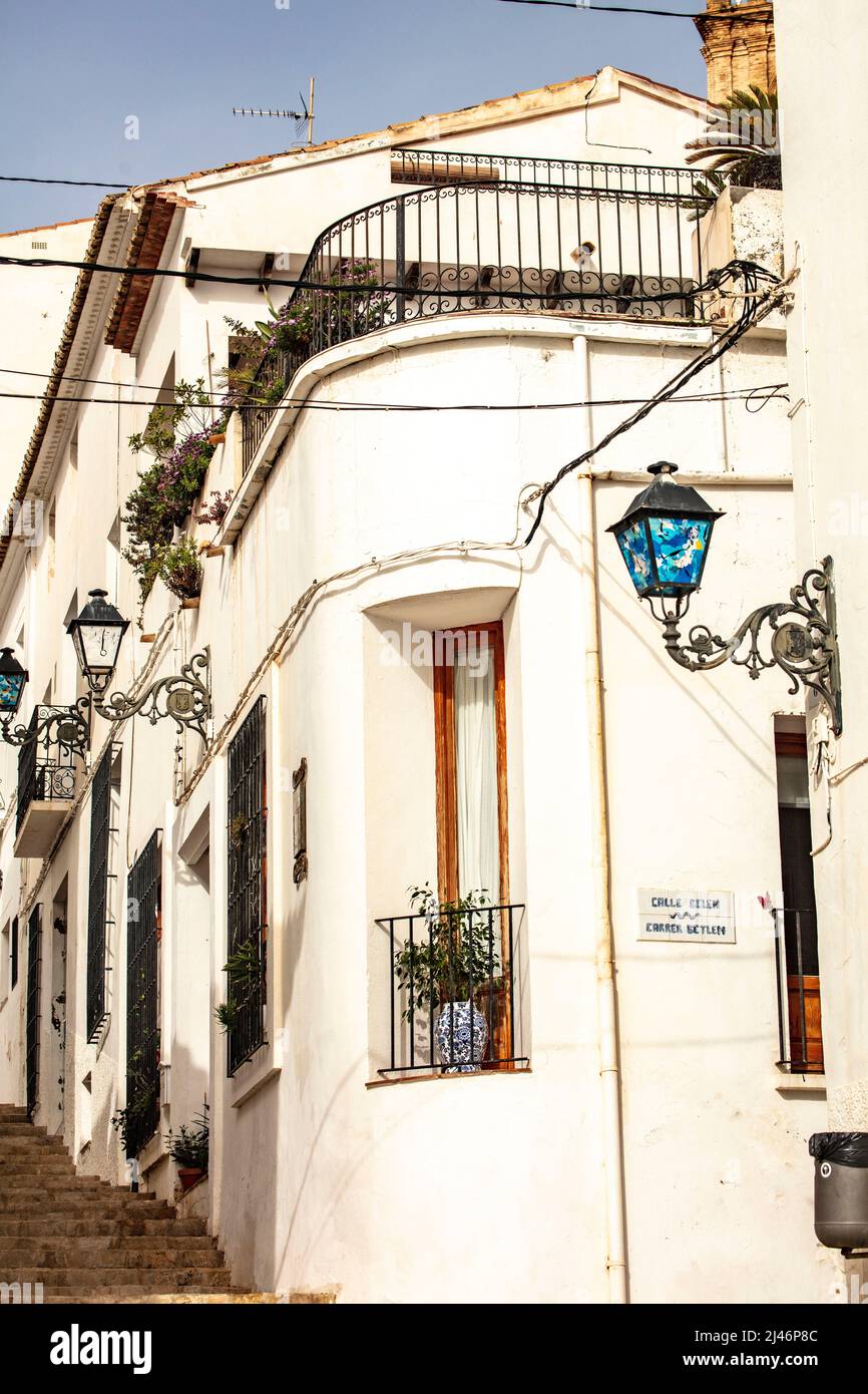 Architectural detail of mainly white dwellings and colourful lamps in ...