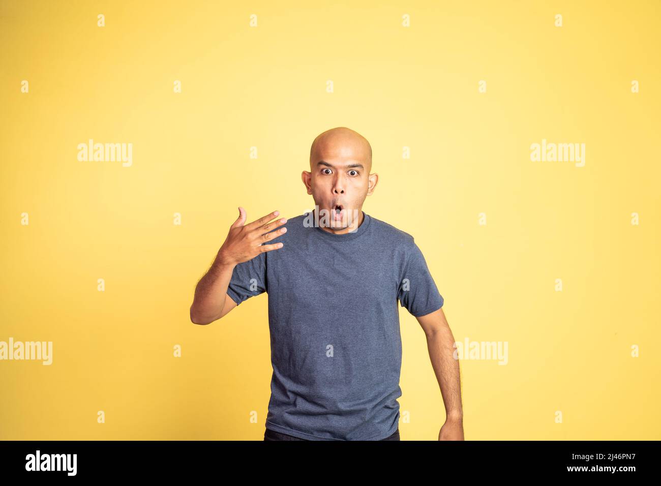 asian bald man opening his mouth with spiciness expression Stock Photo ...