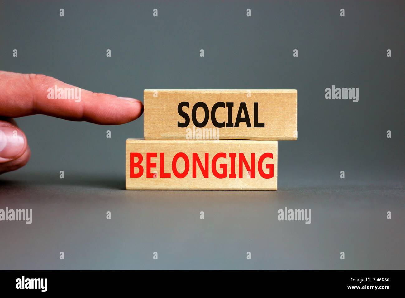 Social belonging symbol. Wooden blocks with concept words Social ...