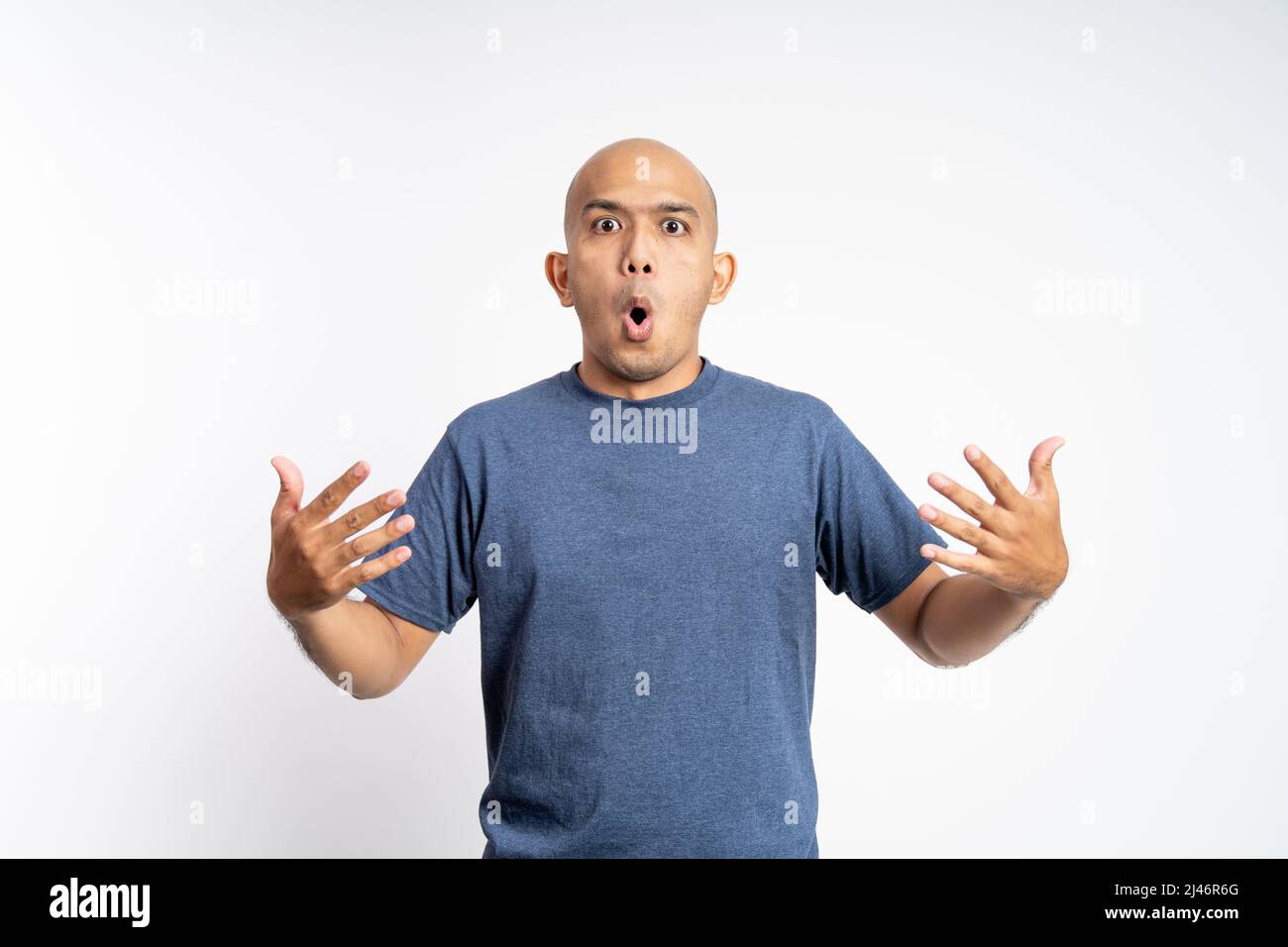 asian bald man with spicy gesture and expression Stock Photo - Alamy
