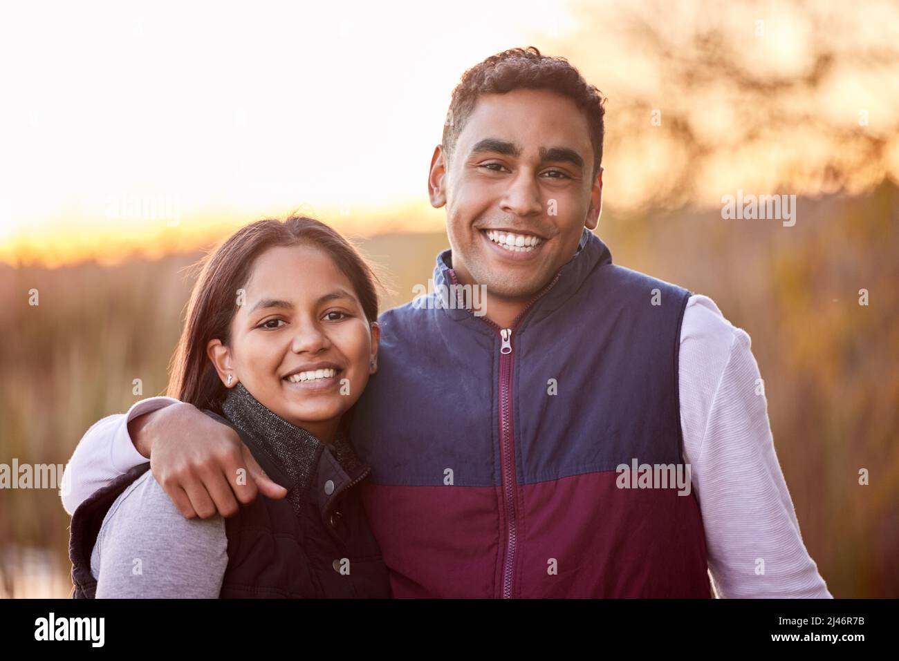 Camping is always the answer. Shot of a young couple having a good time ...