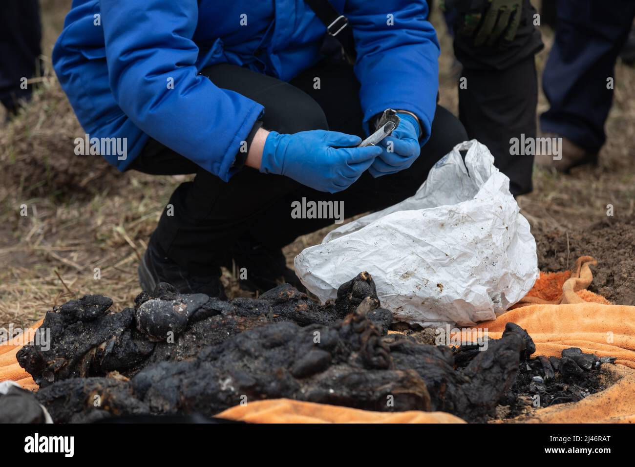 BUCHA, UKRAINE - Apr. 12, 2022: Genocide in Bucha. Forensic police ...