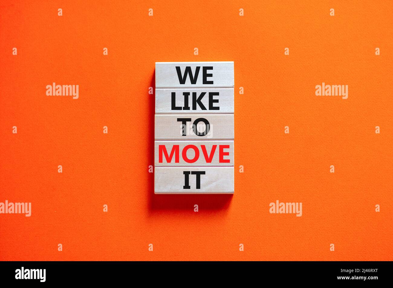 We like to move it symbol. Concept words We like to move it on wooden ...