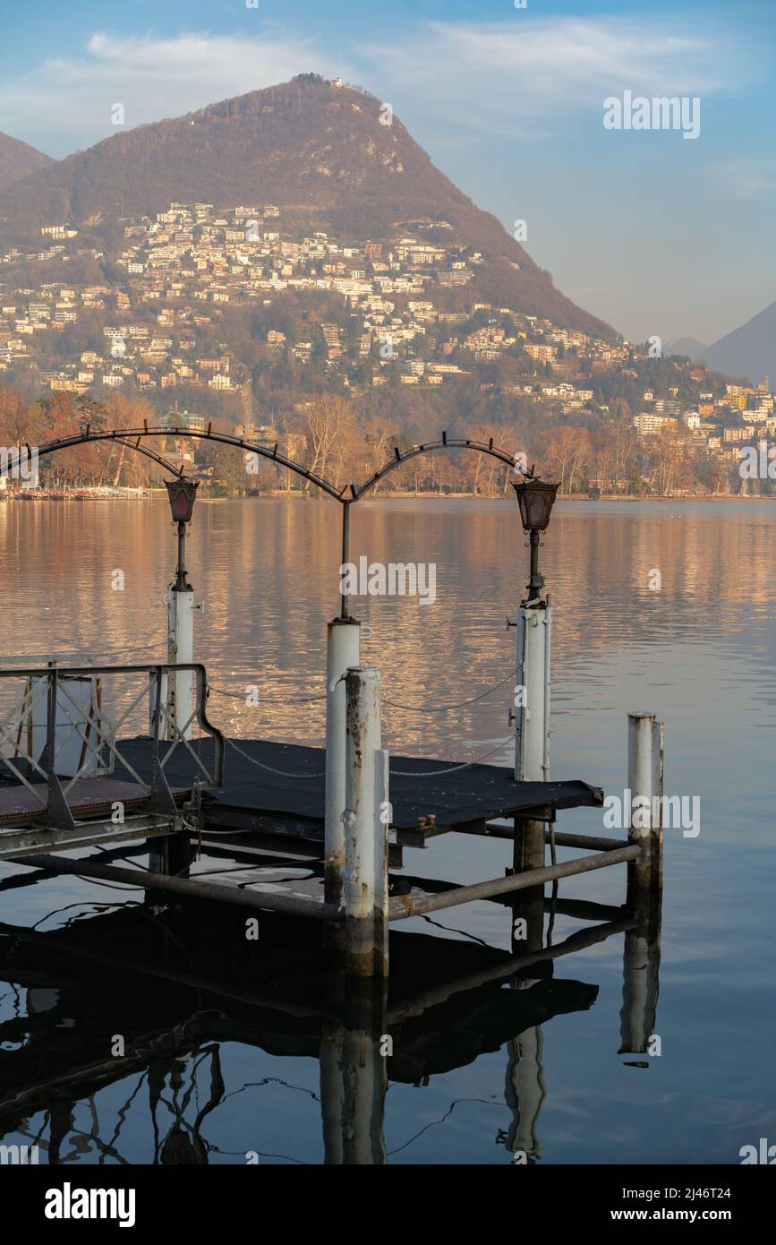 Lugano evening lake view with a bridge Stock Photo - Alamy