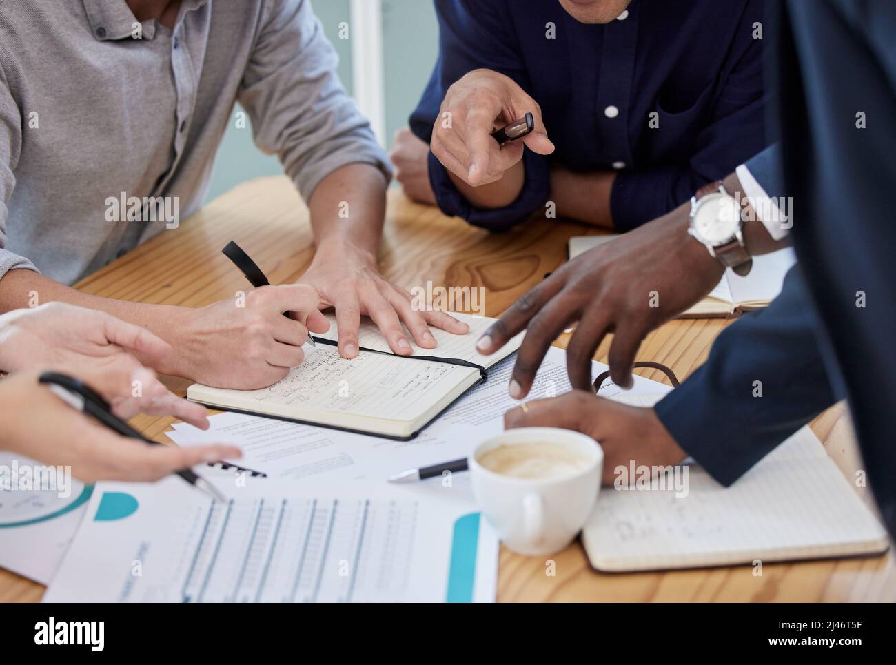 Brainstorming a way forward that works best. Closeup shot of a group of ...