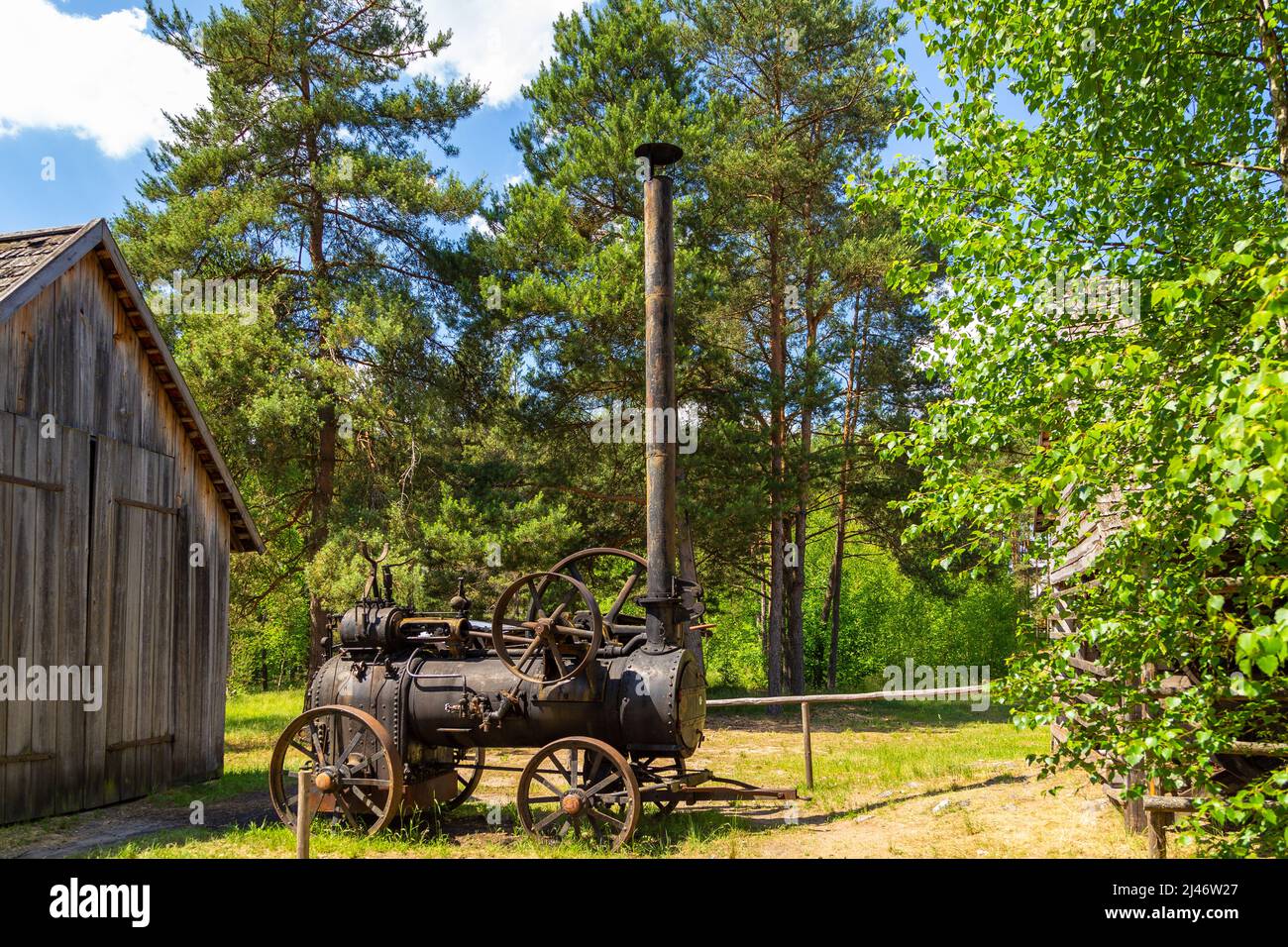 Wdzydze Kiszewskie , Poland - 31 May 2018: Steam engine and sawmill in ... Wdzydze Kiszewskie , Poland - 31 May 2018: Steam engine and sawmill in ...