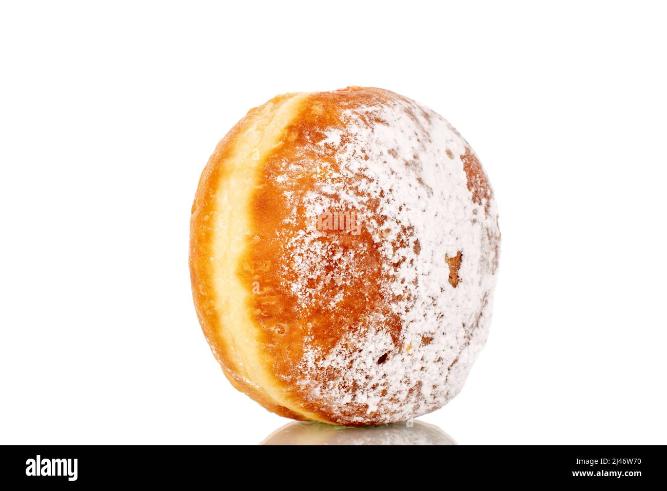 One sweet donut stuffed with jam, close-up, isolated on a white ...