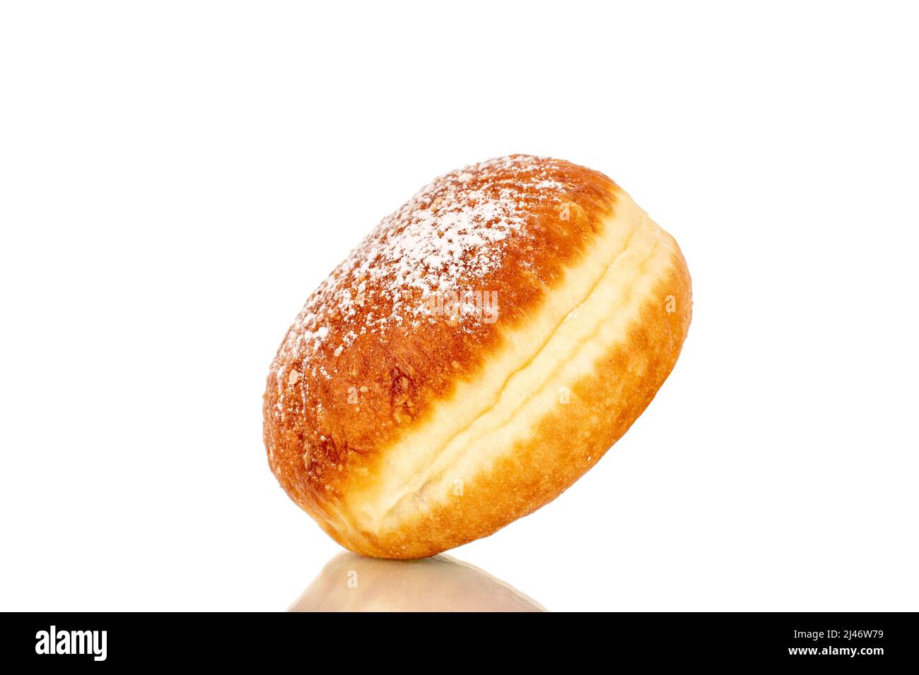One sweet donut stuffed with jam, close-up, isolated on a white ...