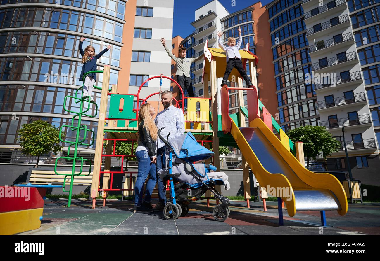 Father daughter on playground slide hi-res stock photography and images ...
