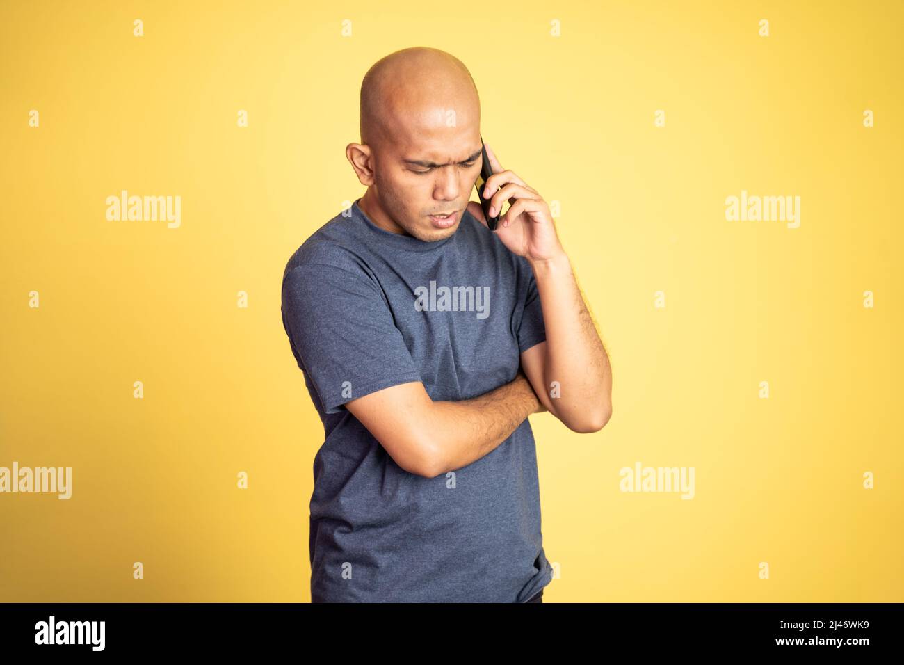 Stressed bald young man hi-res stock photography and images - Alamy