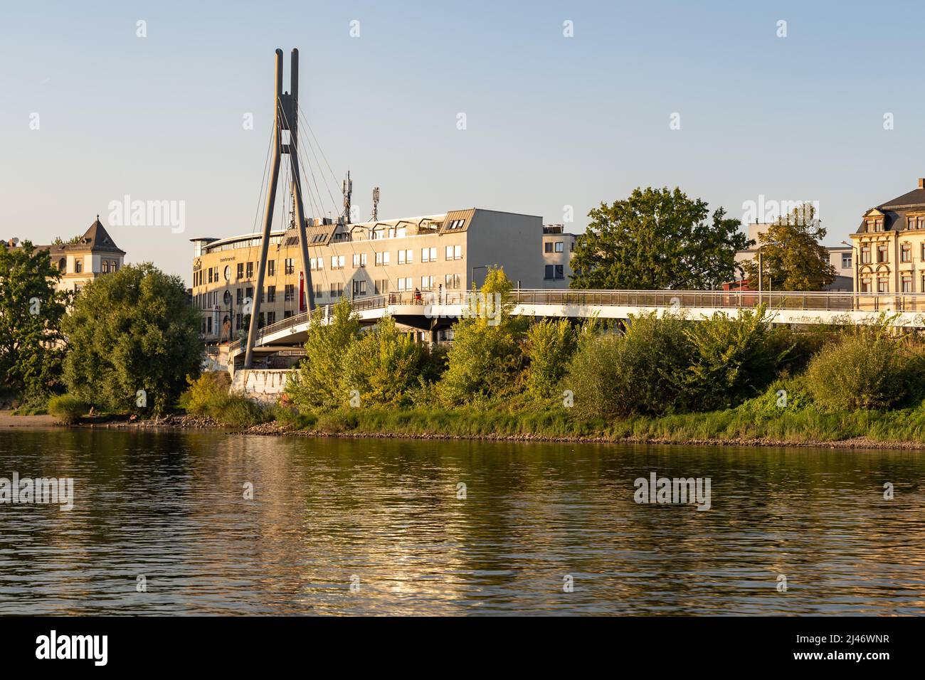 Famous suspension bridge in Dresden Pieschen. Pedestrian bridge in the ...