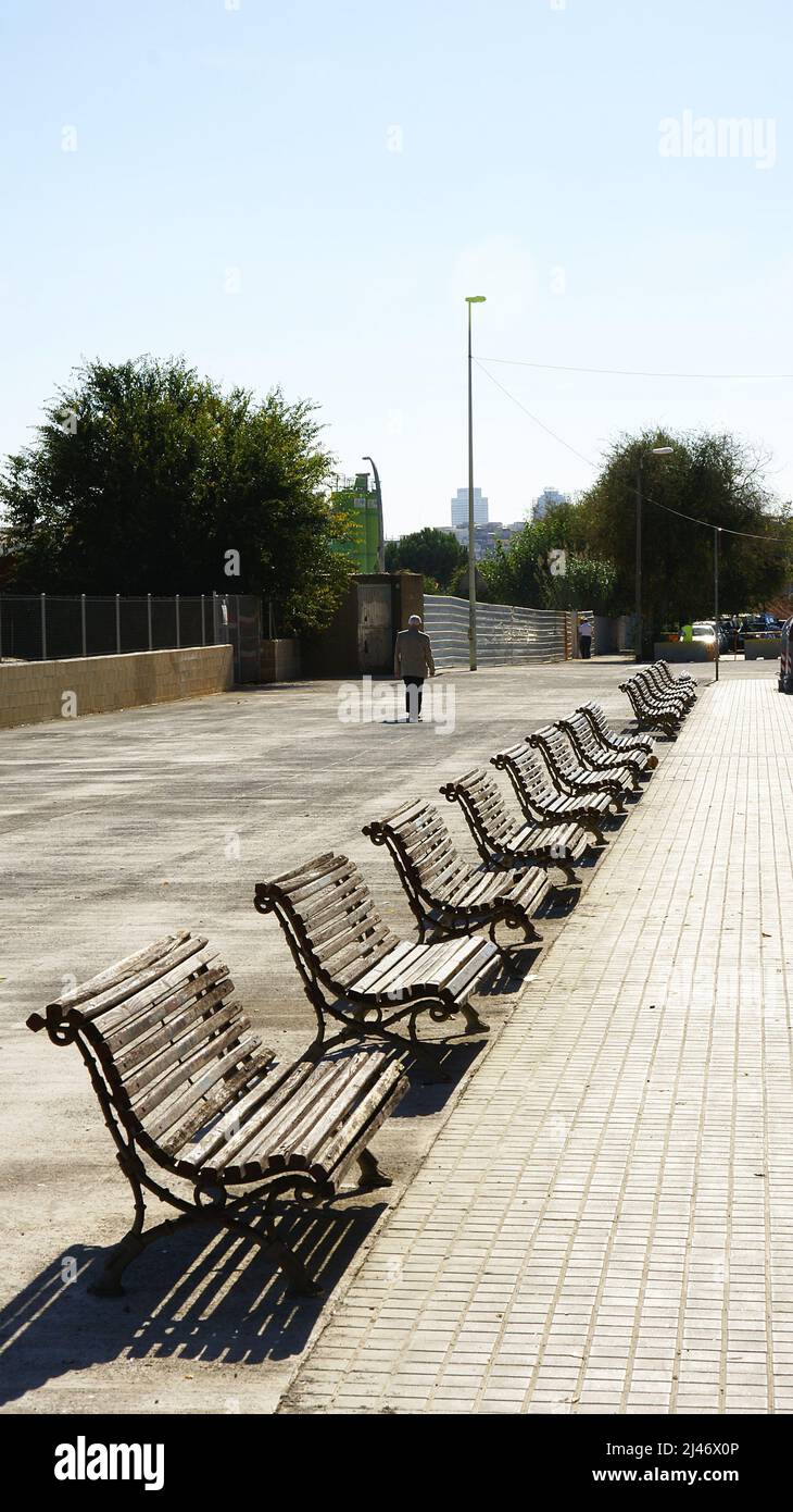 Benches in the street hi-res stock photography and images - Alamy