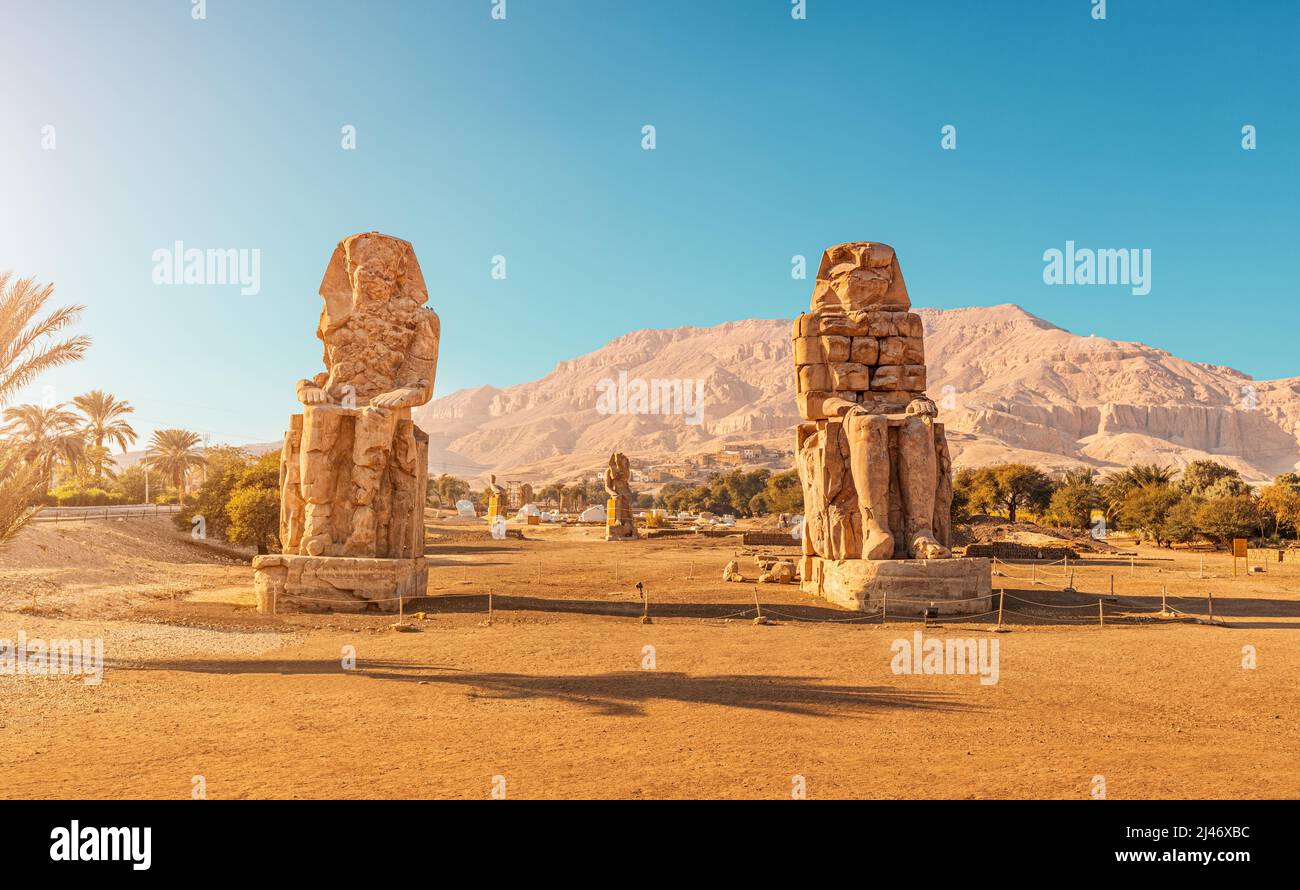 Famous two Colossi of Memnon - massive ruined statues of the Pharaoh ...